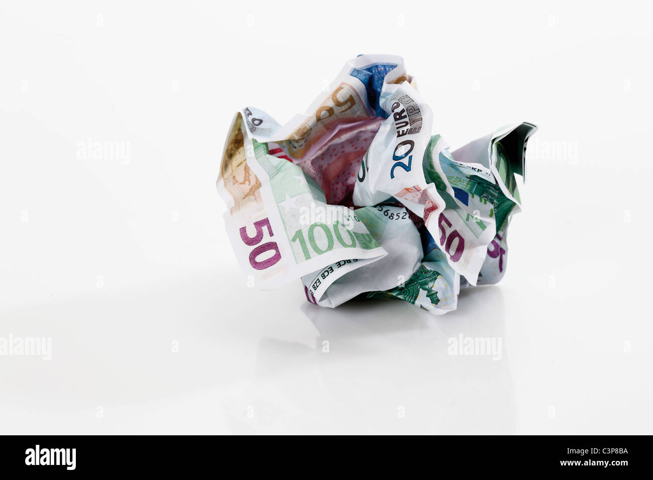 Crumpled euro notes on white background Stock Photo - Alamy