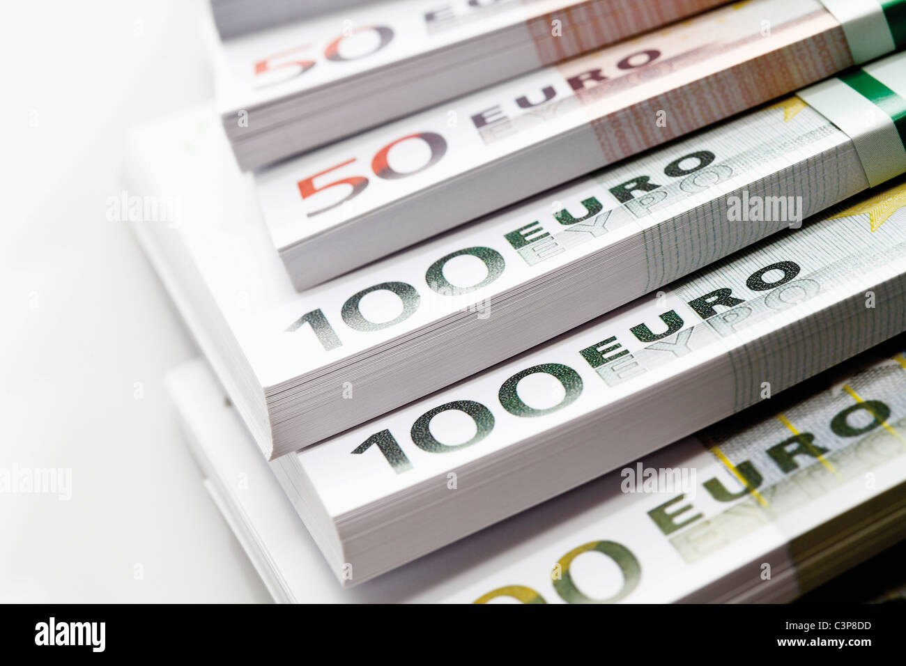 Bundles of Euro banknotes on white background, close-up Stock Photo - Alamy