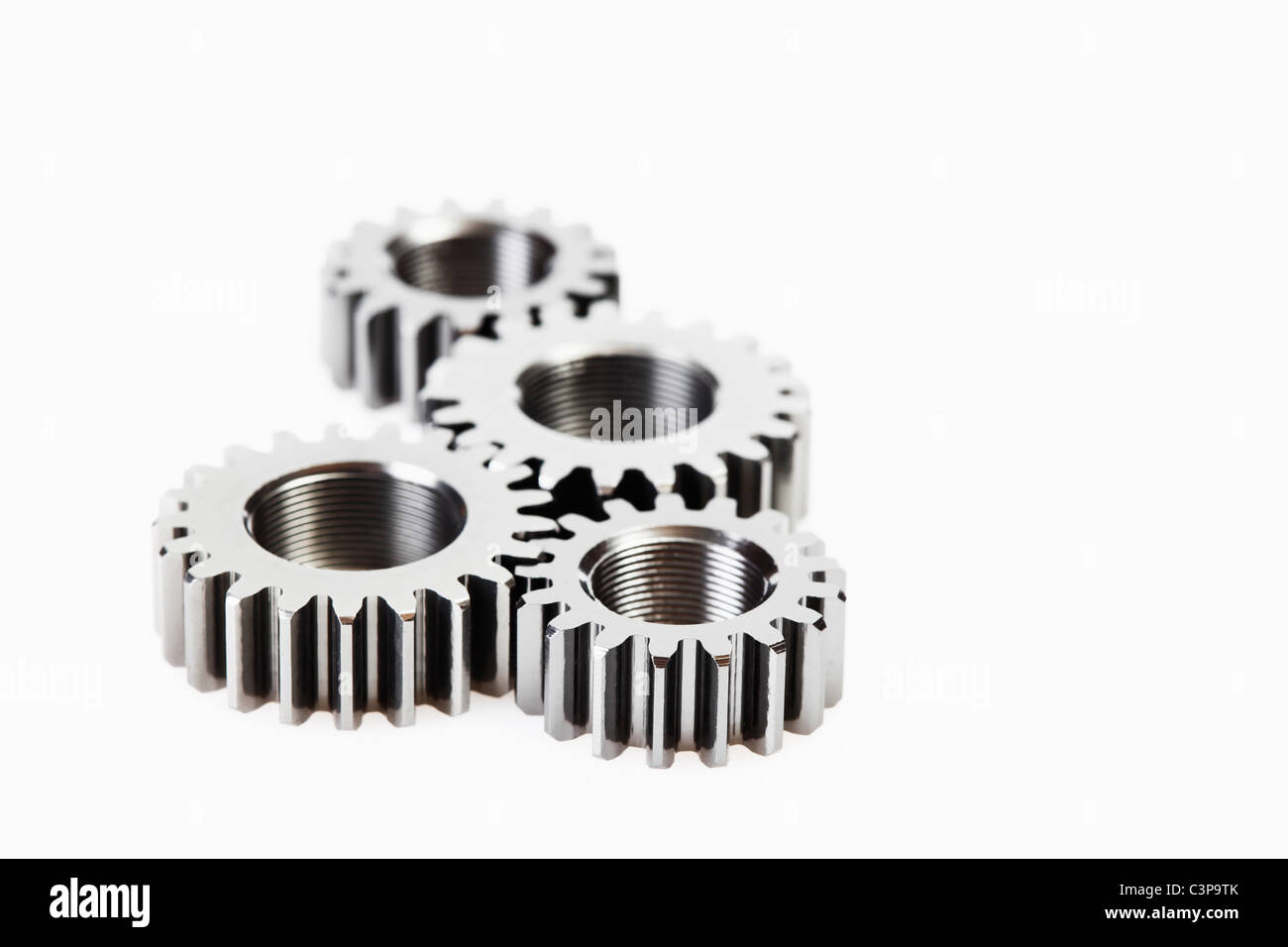 Cogwheels on white background Stock Photo - Alamy