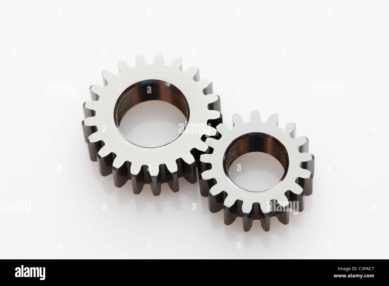 Cogwheels on white background Stock Photo - Alamy