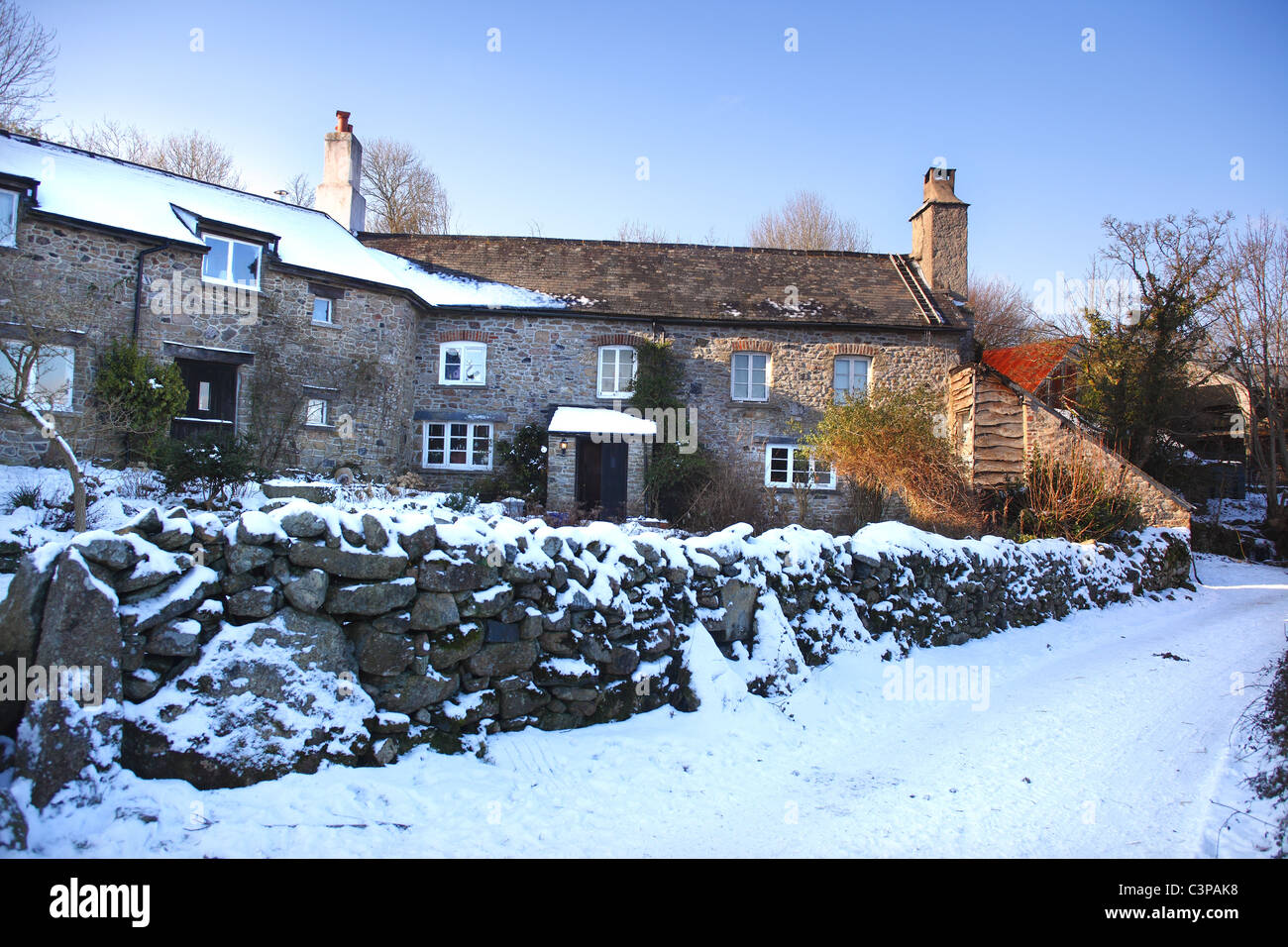 A Devon farmhouse in the snow Stock Photo - Alamy