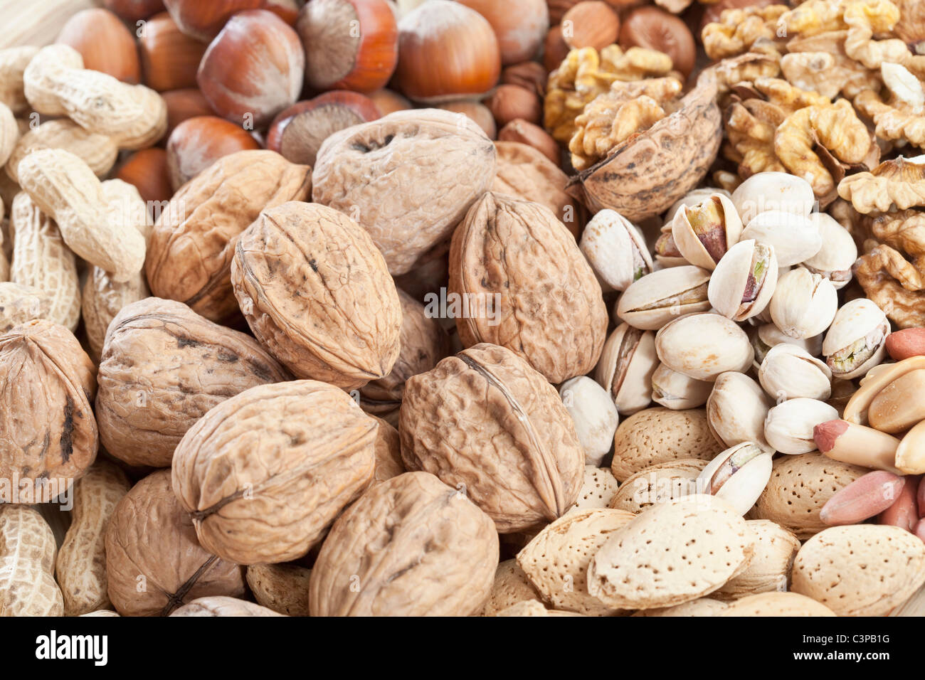 Variety of nuts, full frame Stock Photo - Alamy