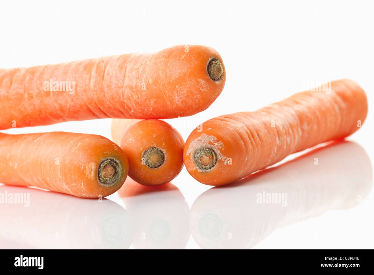 Four carrots hi-res stock photography and images - Alamy