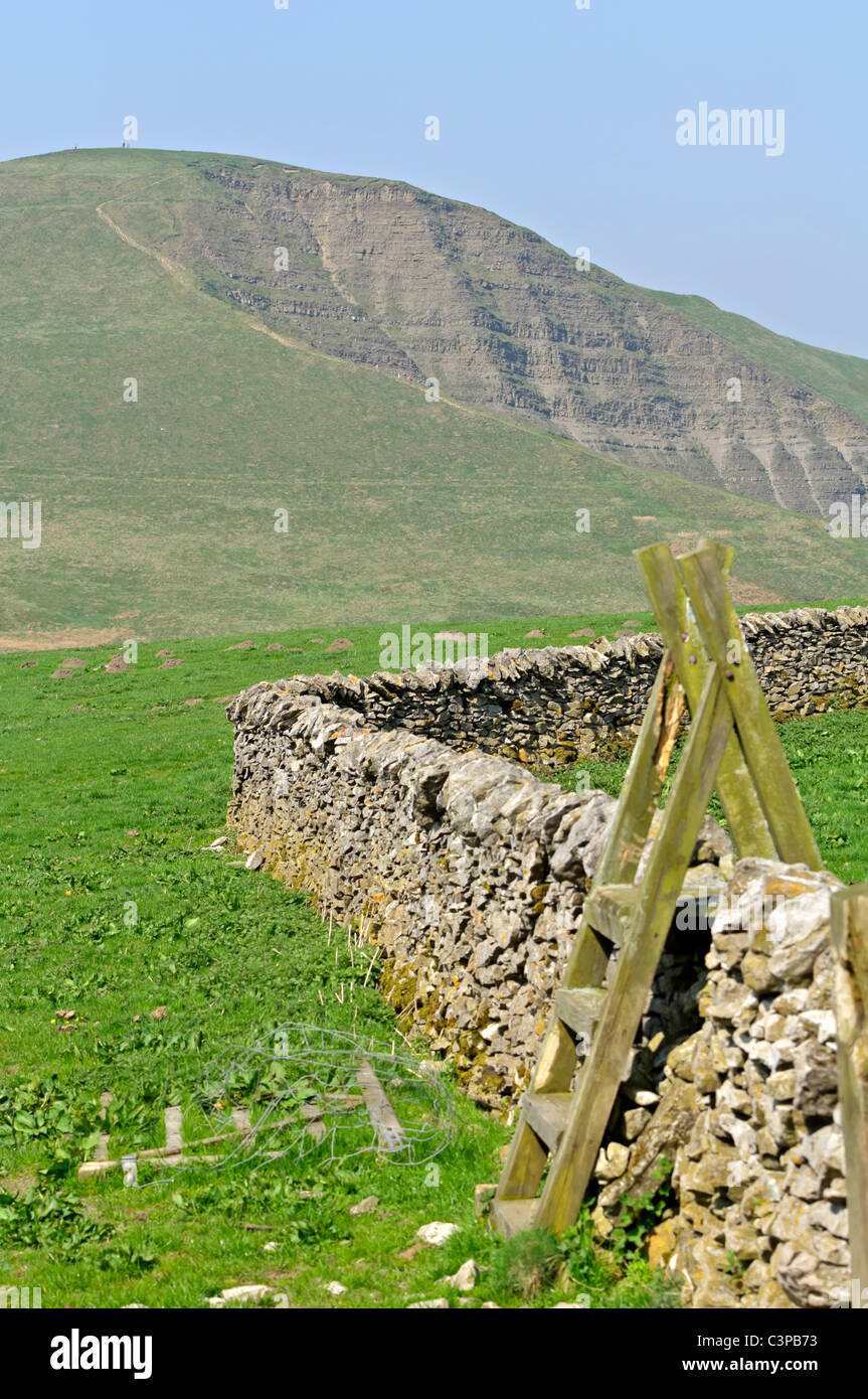 Stile and view of Mam Tor near Castleton in the Peak District National ...