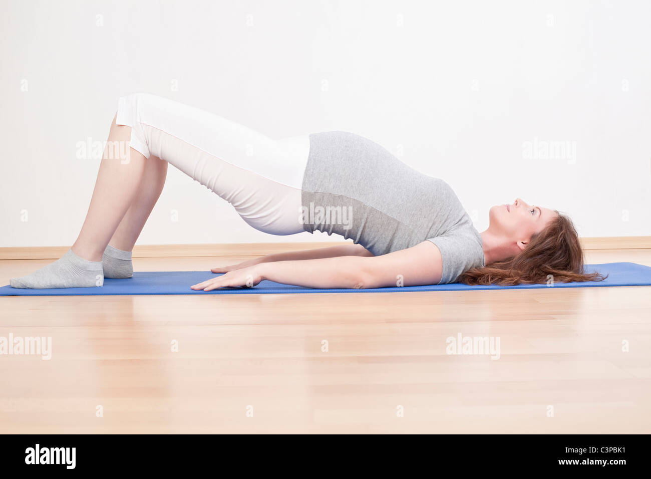 Pregnant yoga pose High Resolution Stock Photography and Images - Alamy