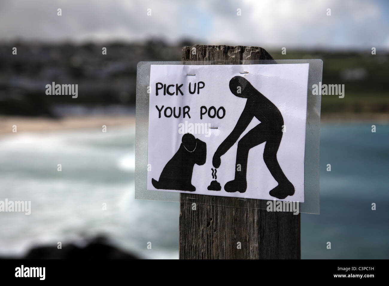 An Impromptu sign requesting dog owners to pick up their poo Stock ...