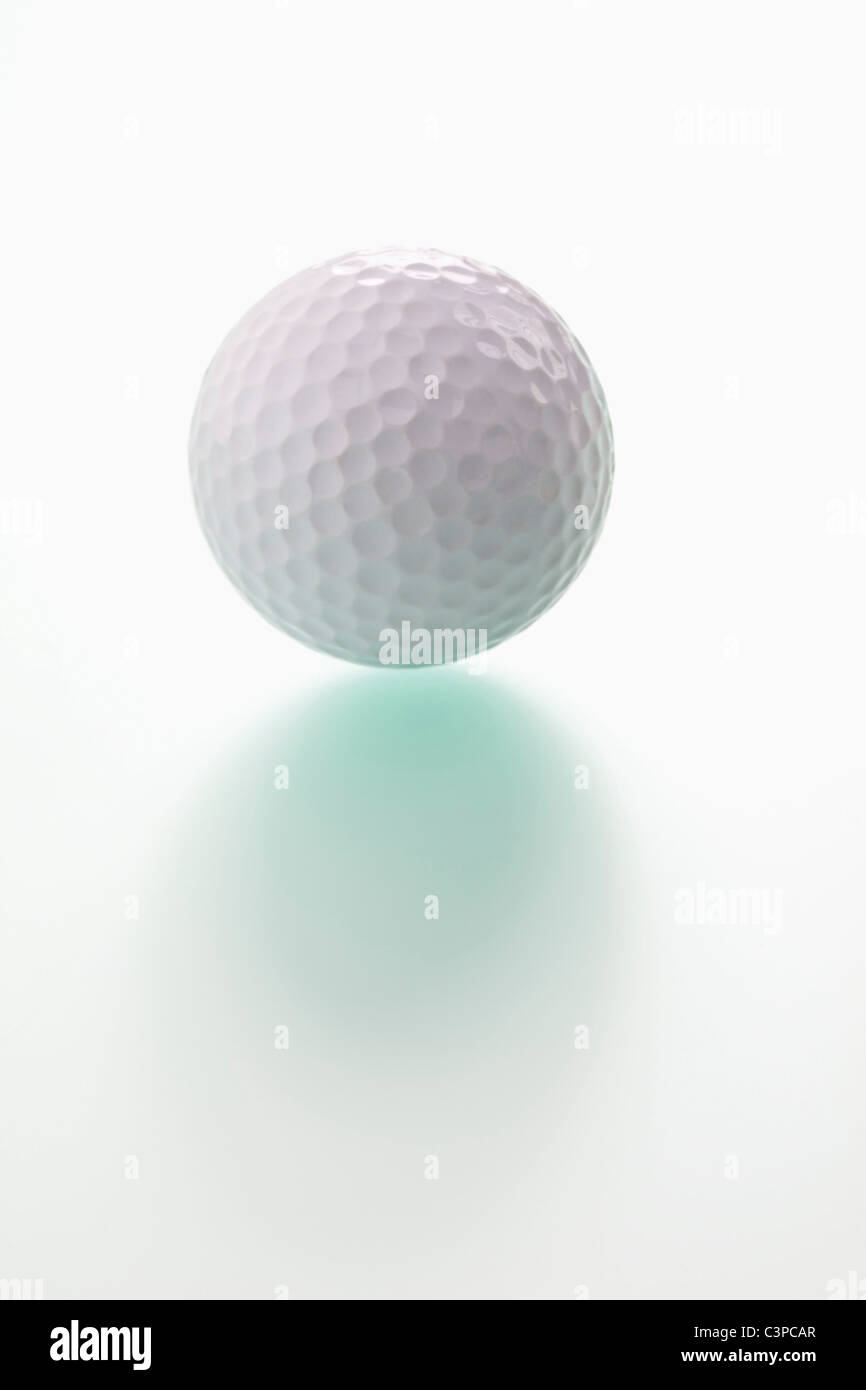 Golf ball on white background Stock Photo - Alamy