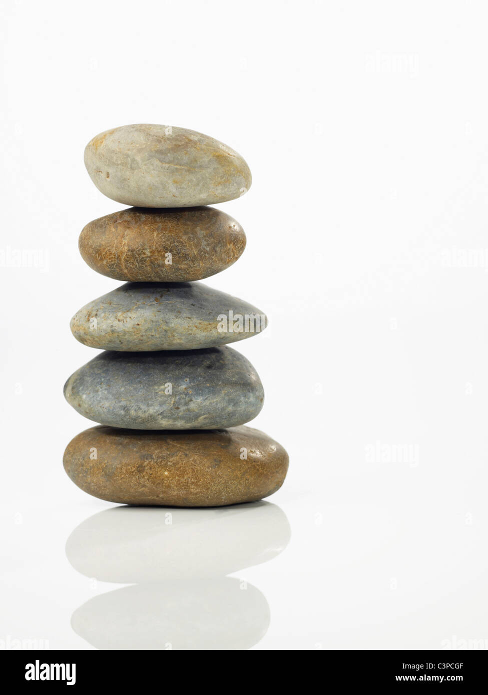 Stack of stones on white background, close up Stock Photo - Alamy