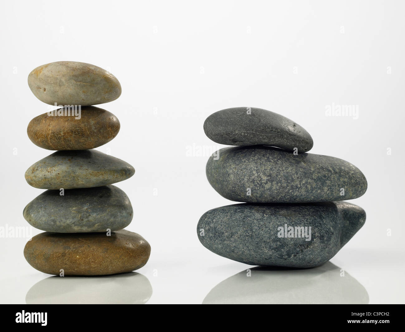 Stack of stones on white background, close up Stock Photo - Alamy