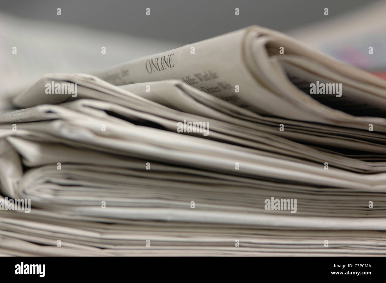 Stack of newspapers, close up Stock Photo - Alamy