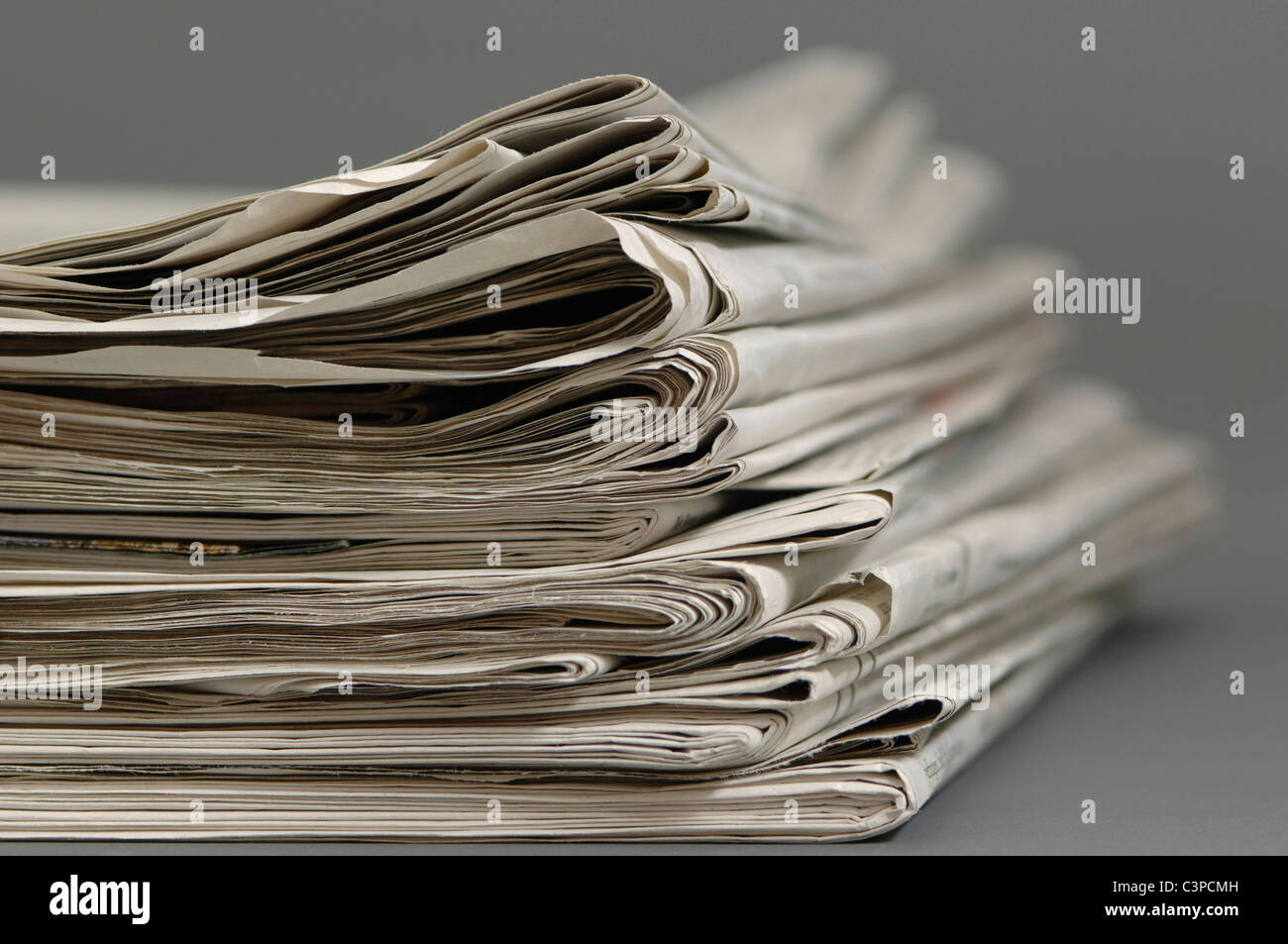Stack of newspapers, close up Stock Photo - Alamy