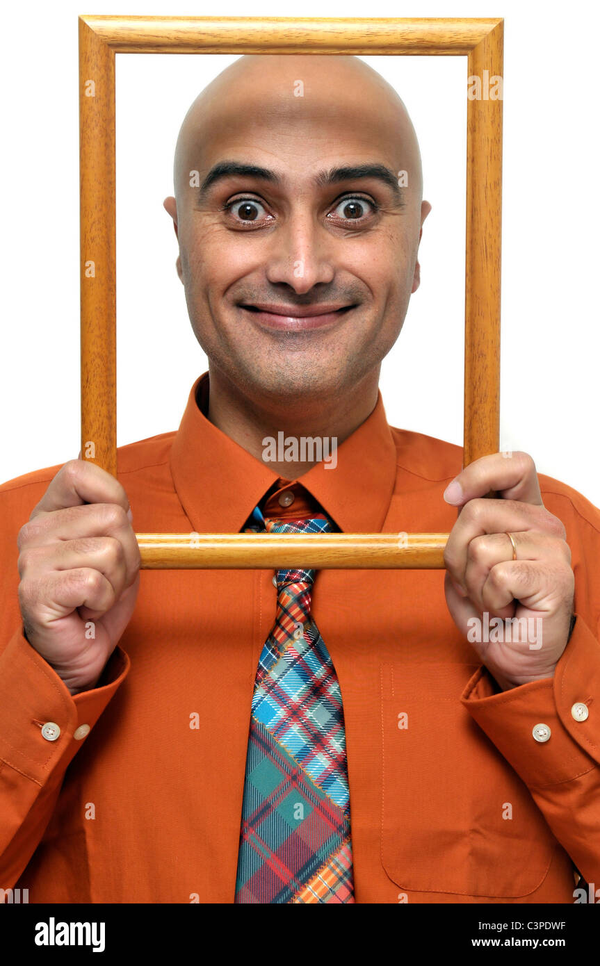 Businessman portrait with a small frame isolated in white Stock Photo ...