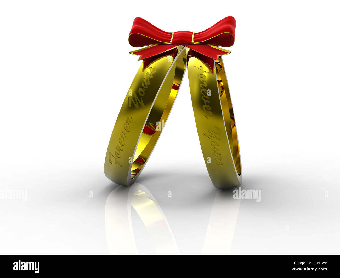 Golden wedding rings with red bow on white background Stock Photo - Alamy