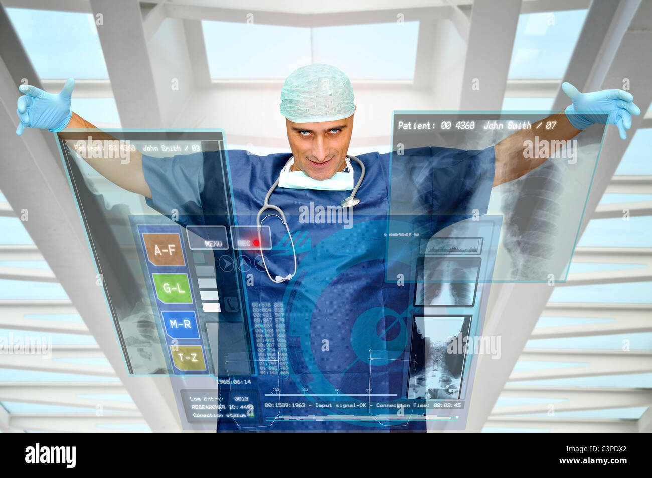 Doctor with high-tech computer screen viewing patient data Stock Photo ...