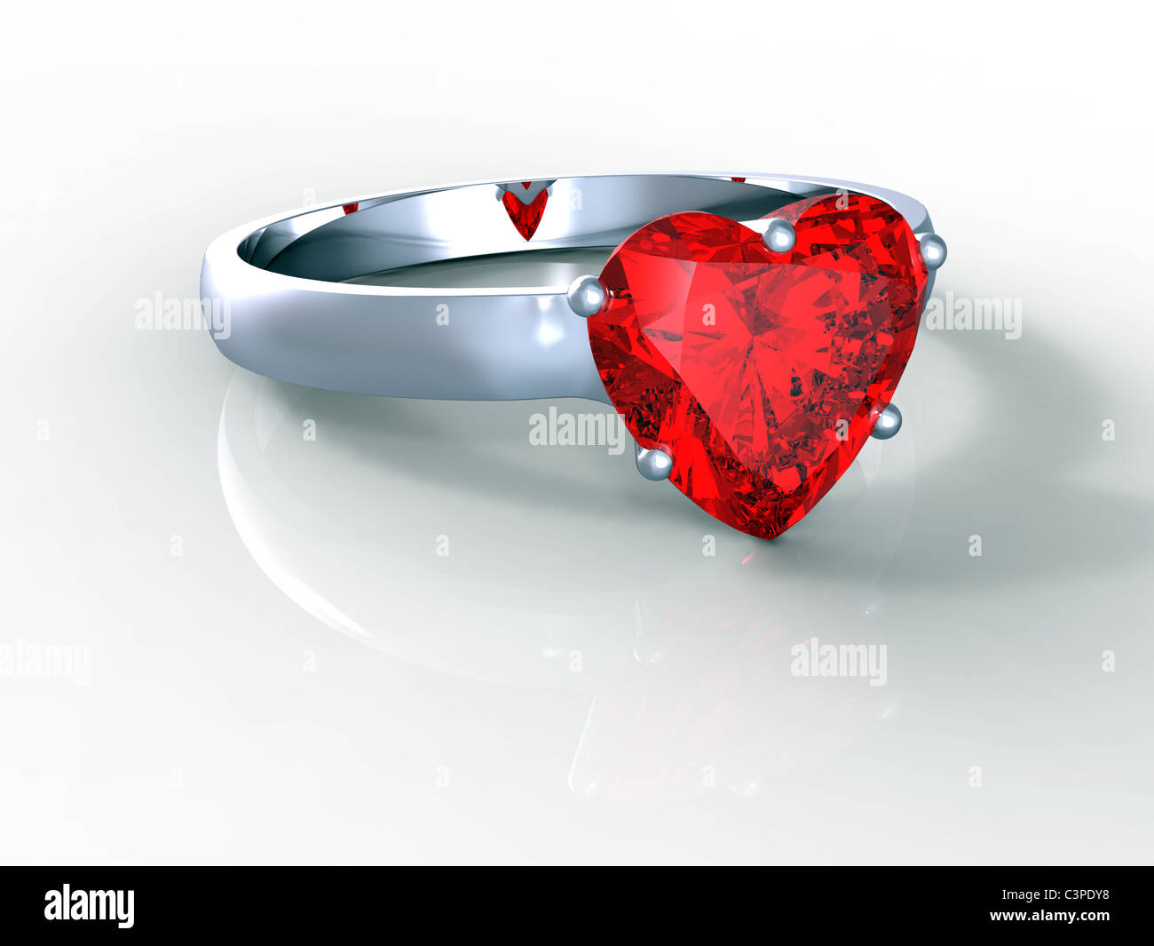 Silver heart shape diamond ring on white background Stock Photo - Alamy