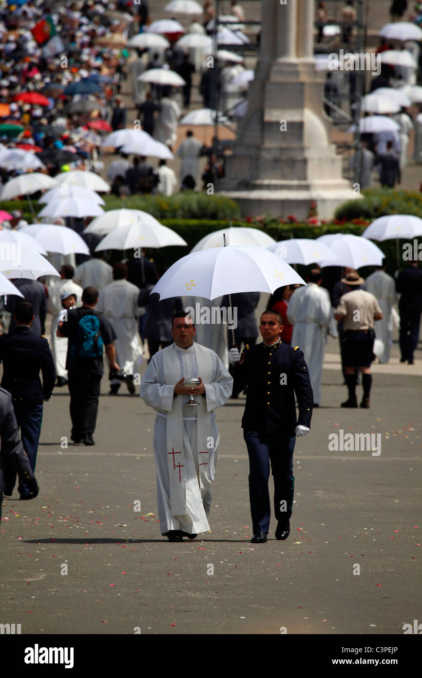Roman Catholic priests lead mass at the Feast of Our Lady of the ...