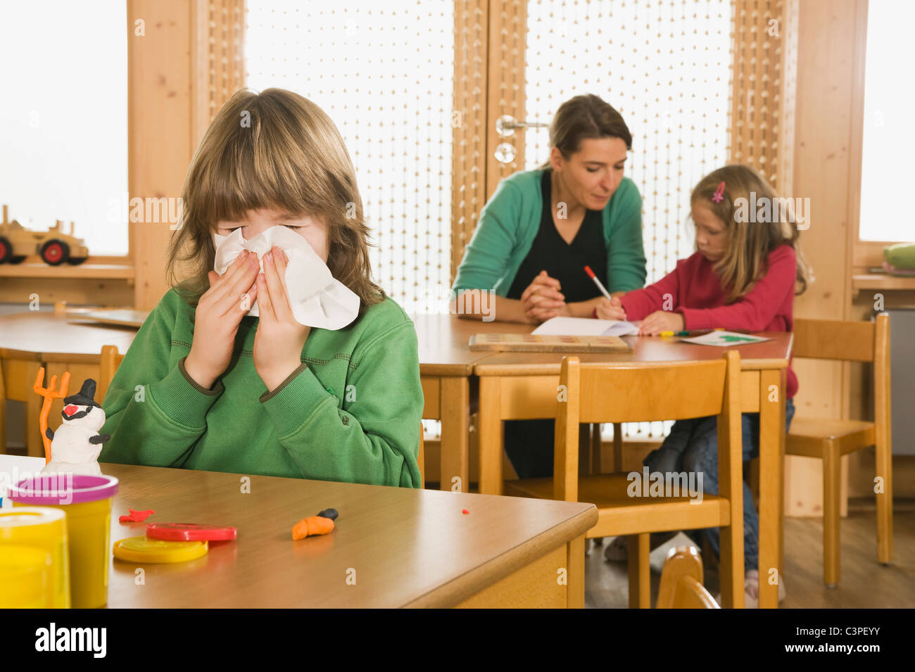 Blowing nose classroom hi-res stock photography and images - Alamy