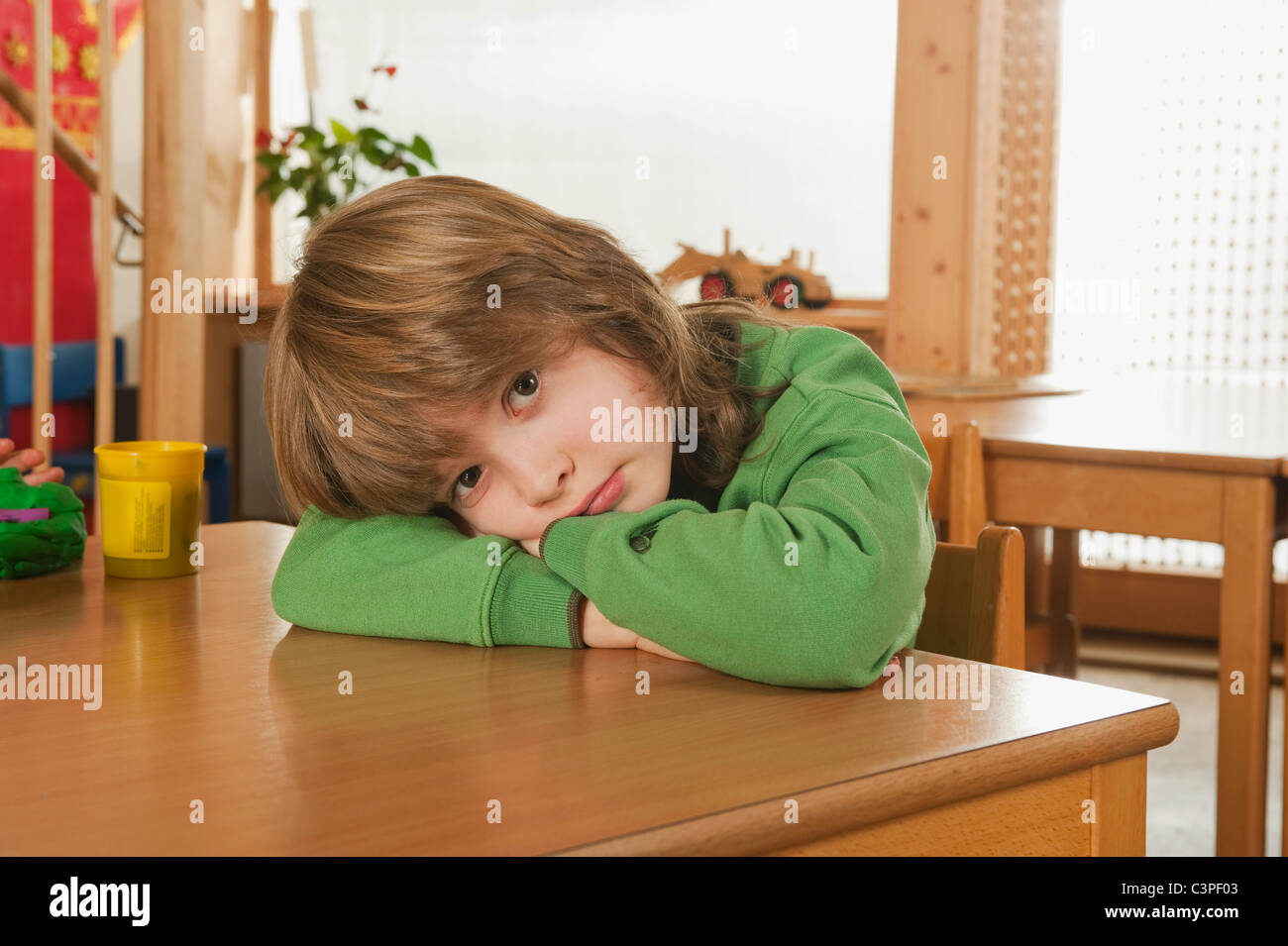 Hand resting on arm chair hi-res stock photography and images - Alamy