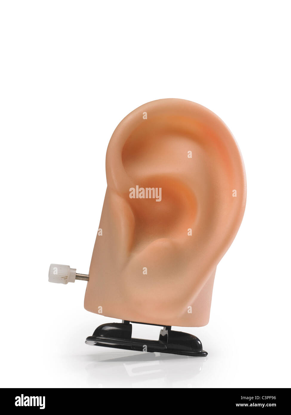 walking wind up toy human ear cut out on white Stock Photo - Alamy