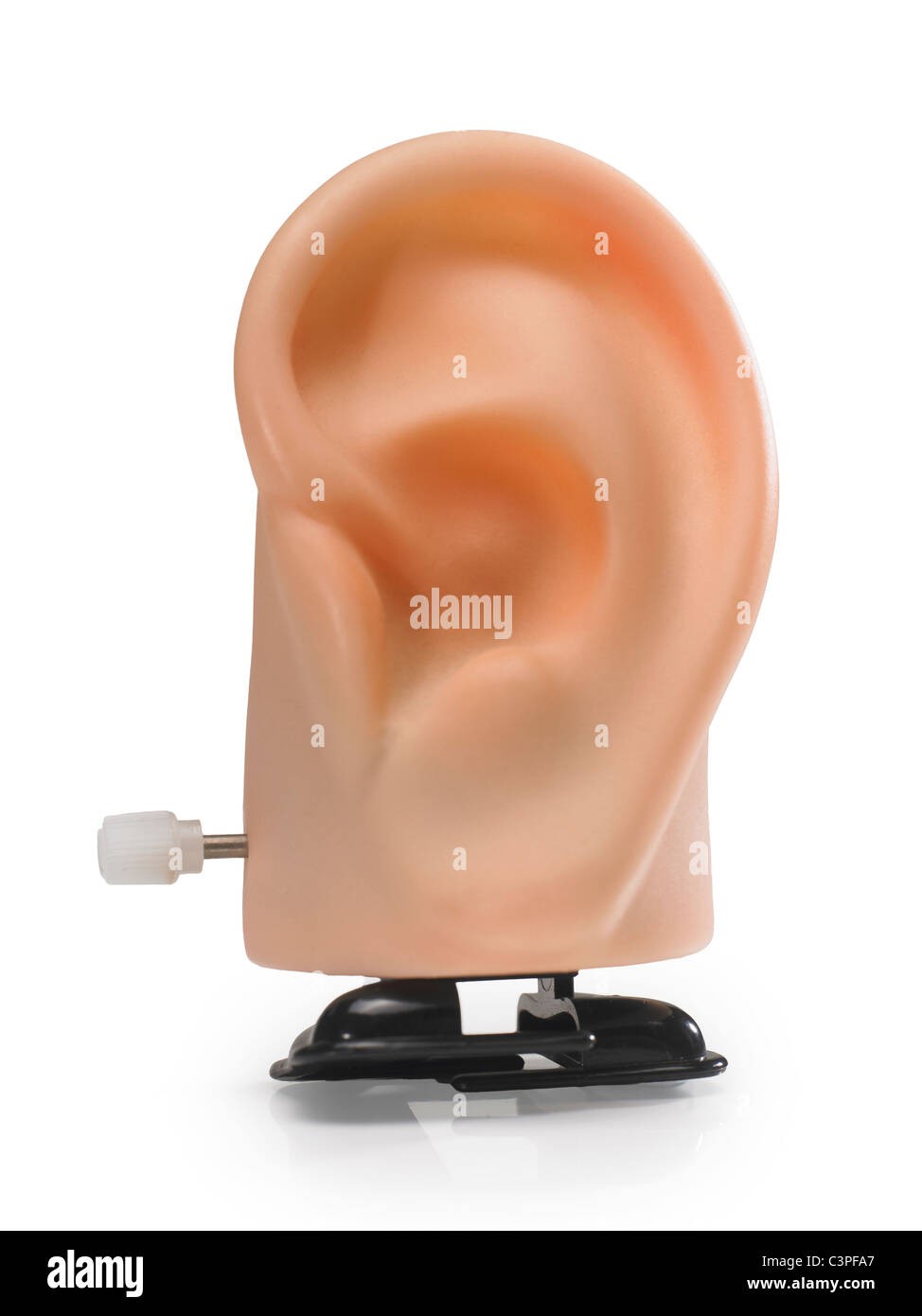 walking wind up toy human ear cut out on white Stock Photo - Alamy