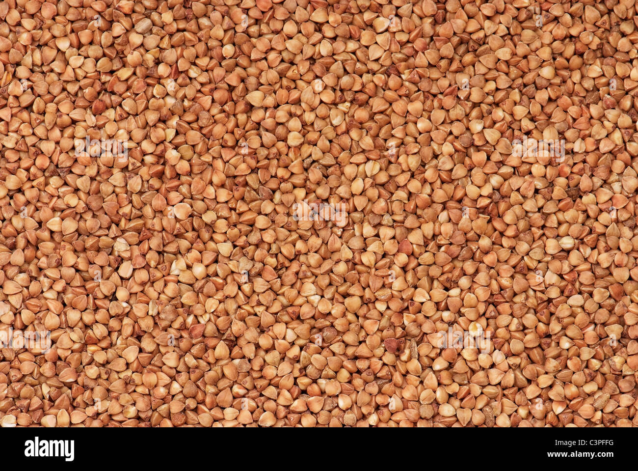 buckwheat grains, background Stock Photo - Alamy