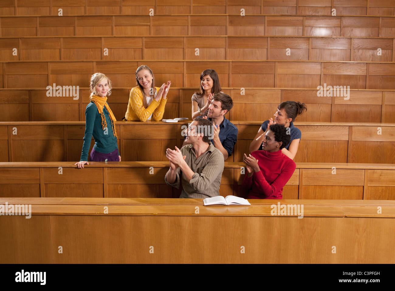 Students clapping in classroom hi-res stock photography and images - Alamy