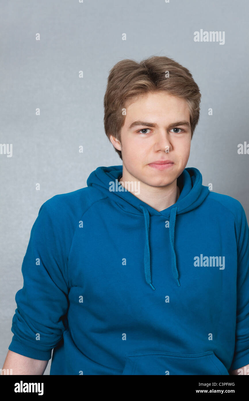 Germany, Berlin, Teenage boy smiling, portrait Stock Photo - Alamy
