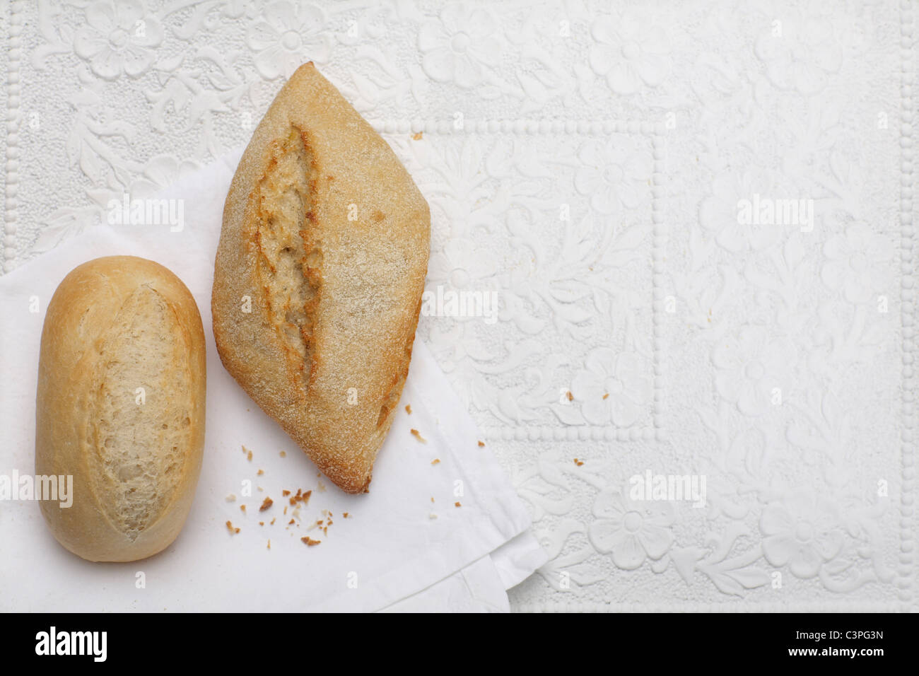 Two bread rolls, elevated view Stock Photo - Alamy