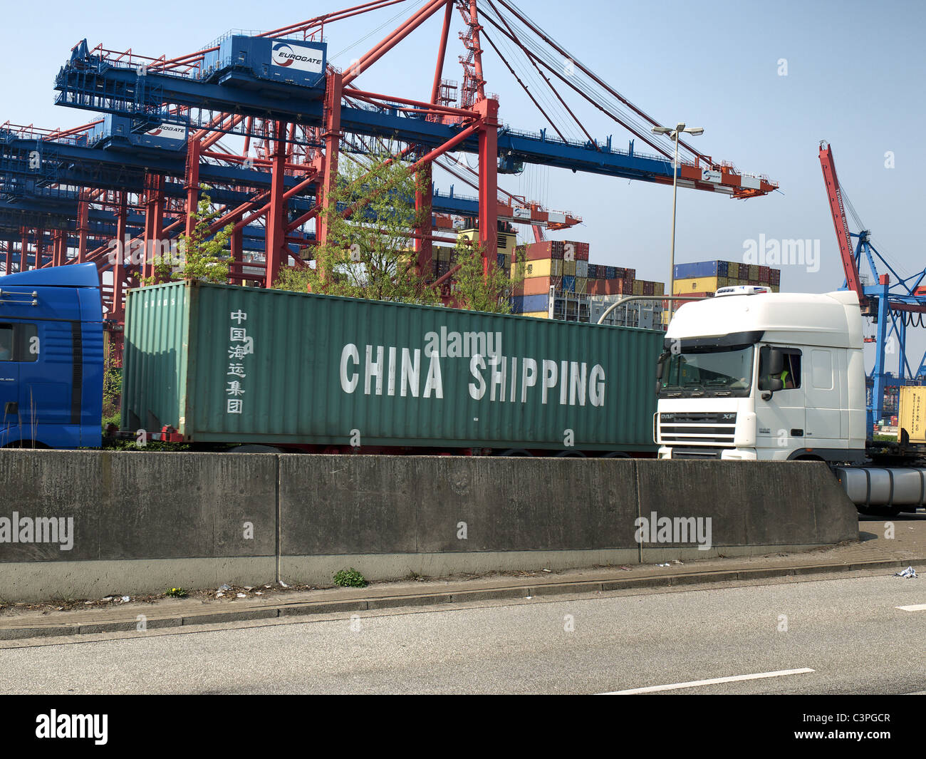 Truck with China Shipping 40' container leaving the container terminal ...