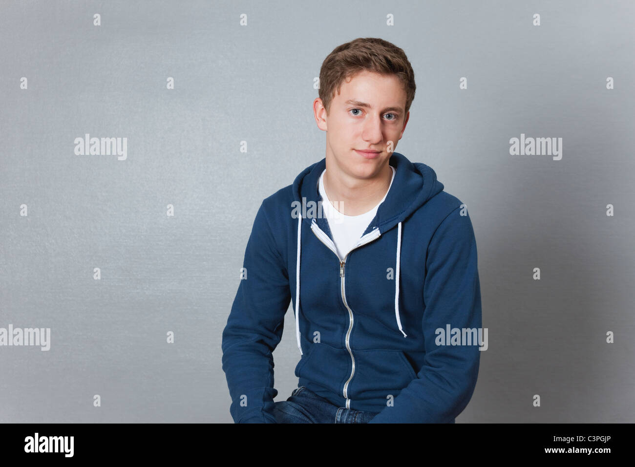 Germany, Berlin, Teenage boy smiling, portrait Stock Photo - Alamy