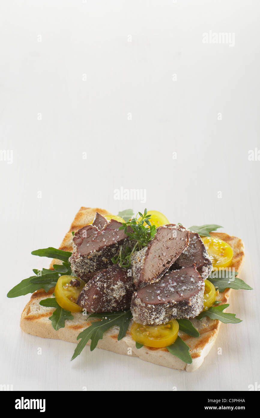 Chicken liver sandwich with tomatos and roquette, close-up Stock Photo ...