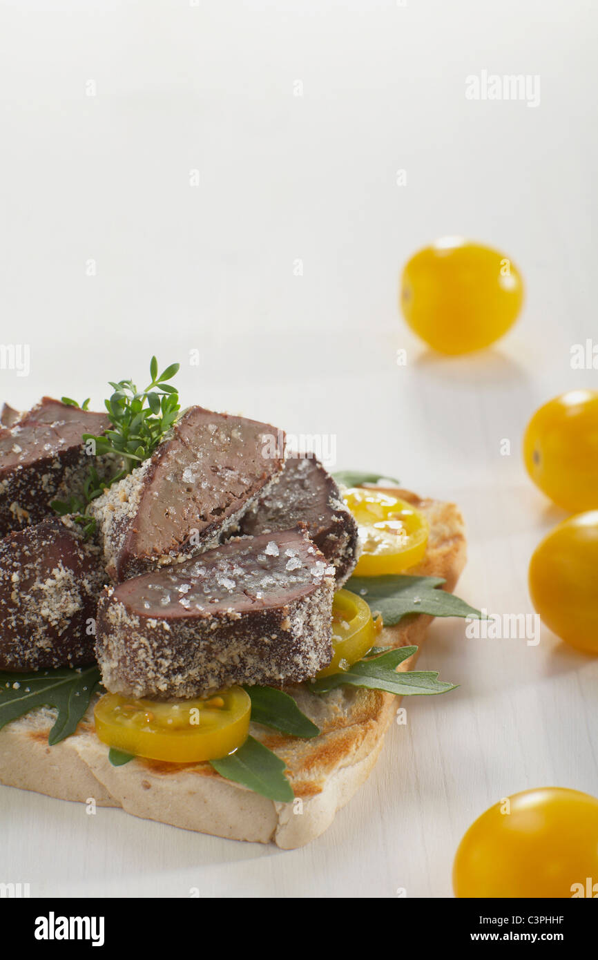 Chicken liver sandwich with tomatos and roquette, close-up Stock Photo ...
