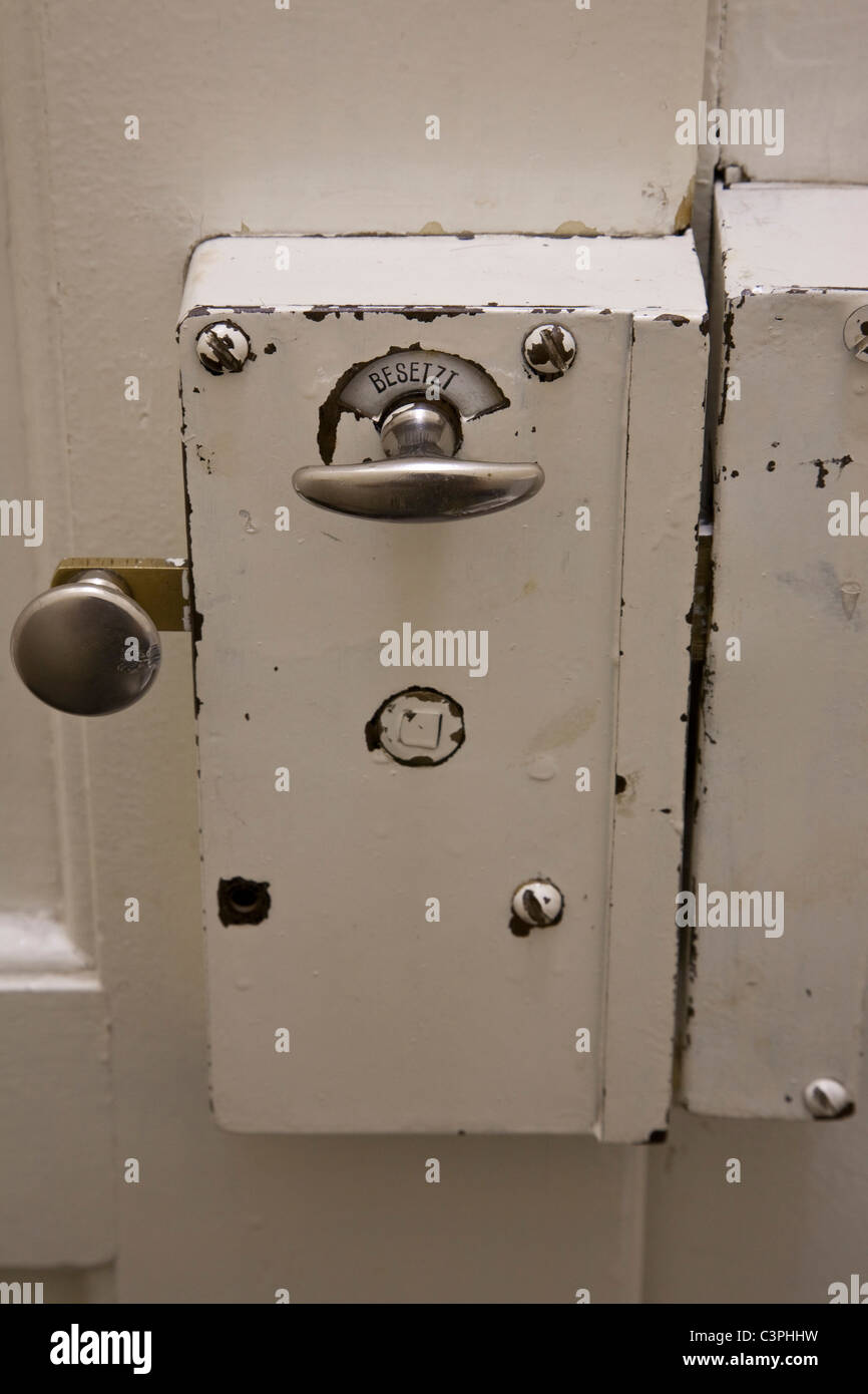 Switzerland, Engaged sign on toilet door, close-up Stock Photo - Alamy