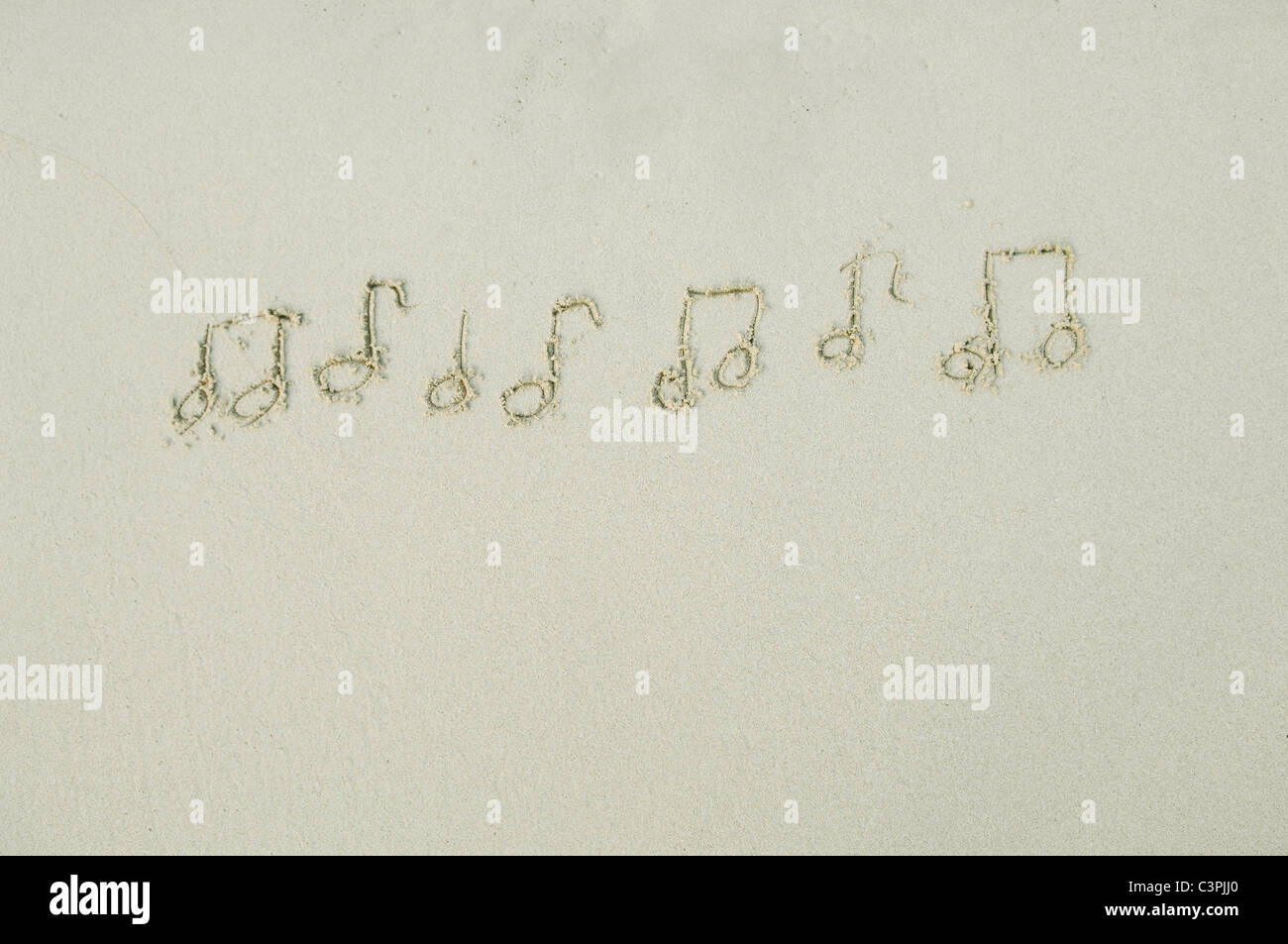 Musical notes drawn sand hi-res stock photography and images - Alamy