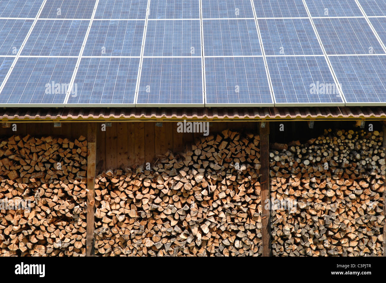 Germany, Bavaria, Wood shack with solar cell roof, close up Stock Photo ...