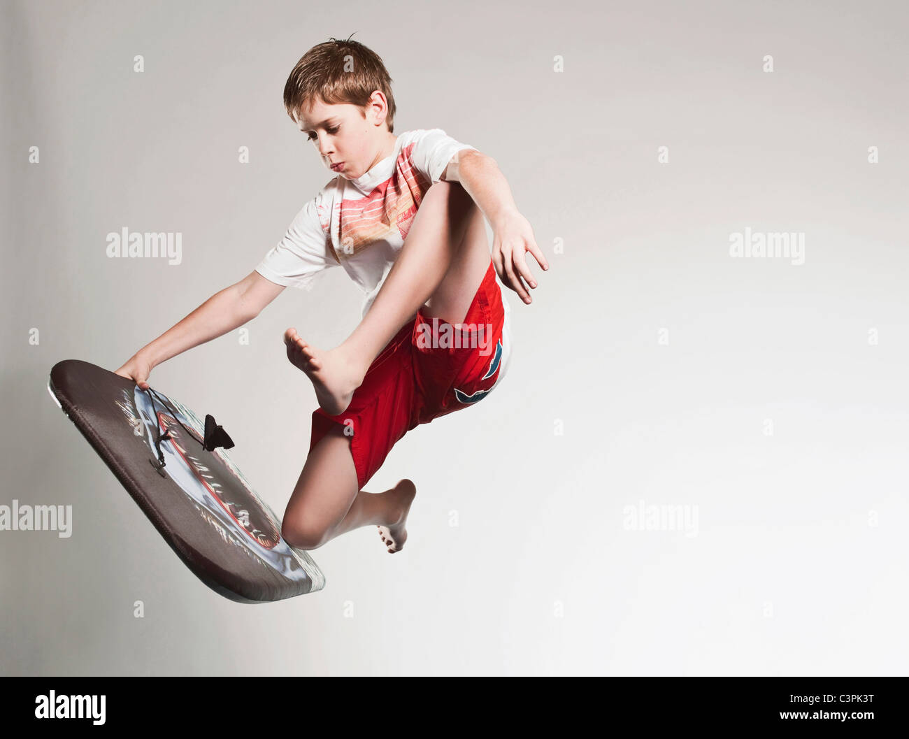 Children with boogie board hi-res stock photography and images - Alamy