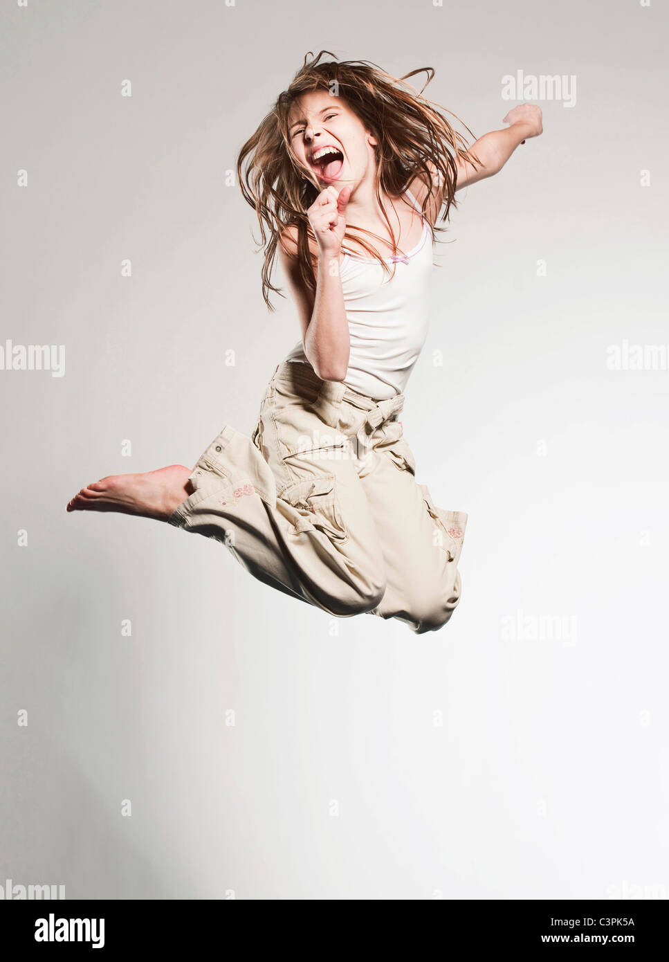 Children cheering jumping hi-res stock photography and images - Alamy