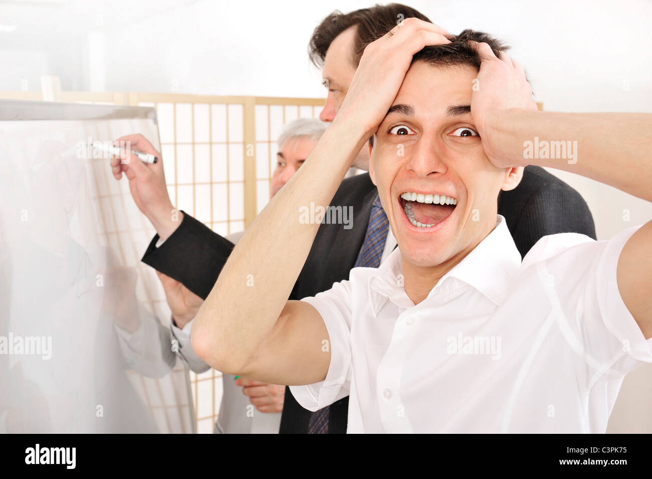 Portrait of a team planning. Office background Stock Photo - Alamy