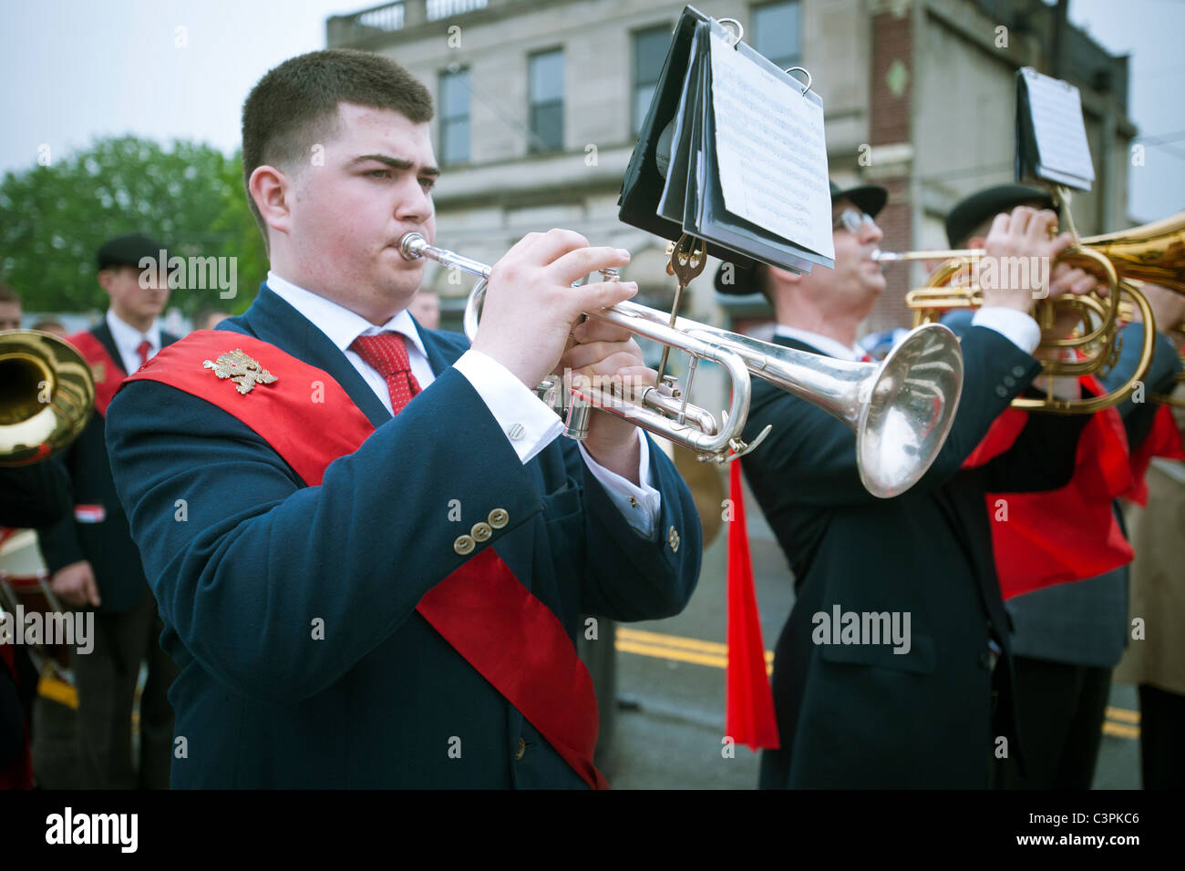 Members of the Holy Choirs of Angels marching band in the New York ...