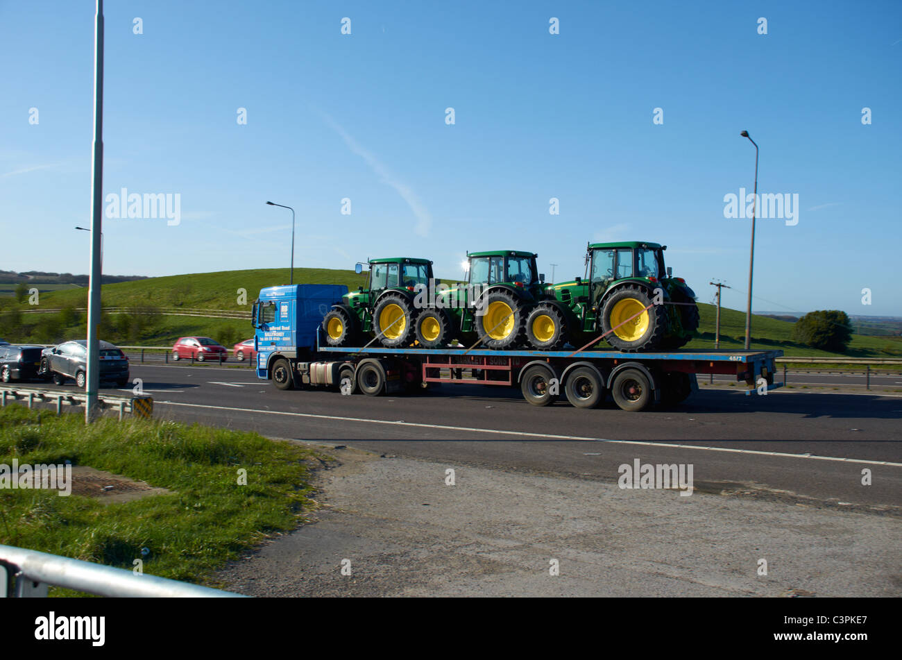 Low loader carrying tractors on hi-res stock photography and images - Alamy