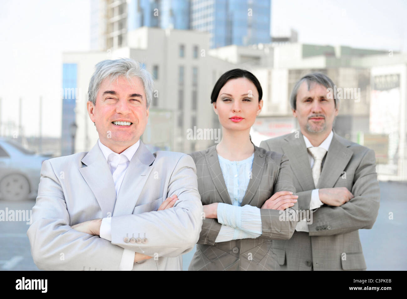 Portrait of three business people outside. Outside background Stock ...