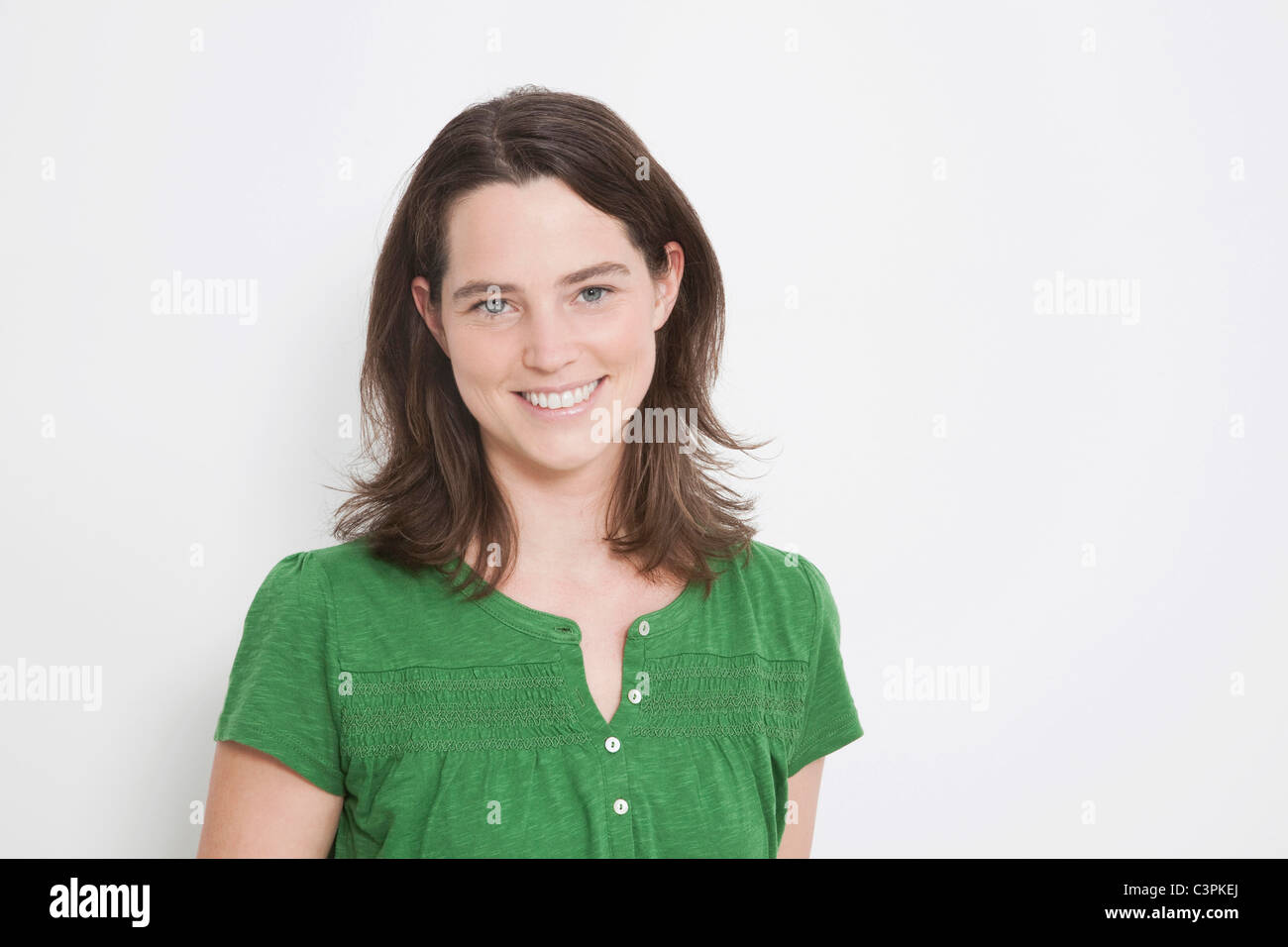 Woman looking at camera, smiling Stock Photo - Alamy
