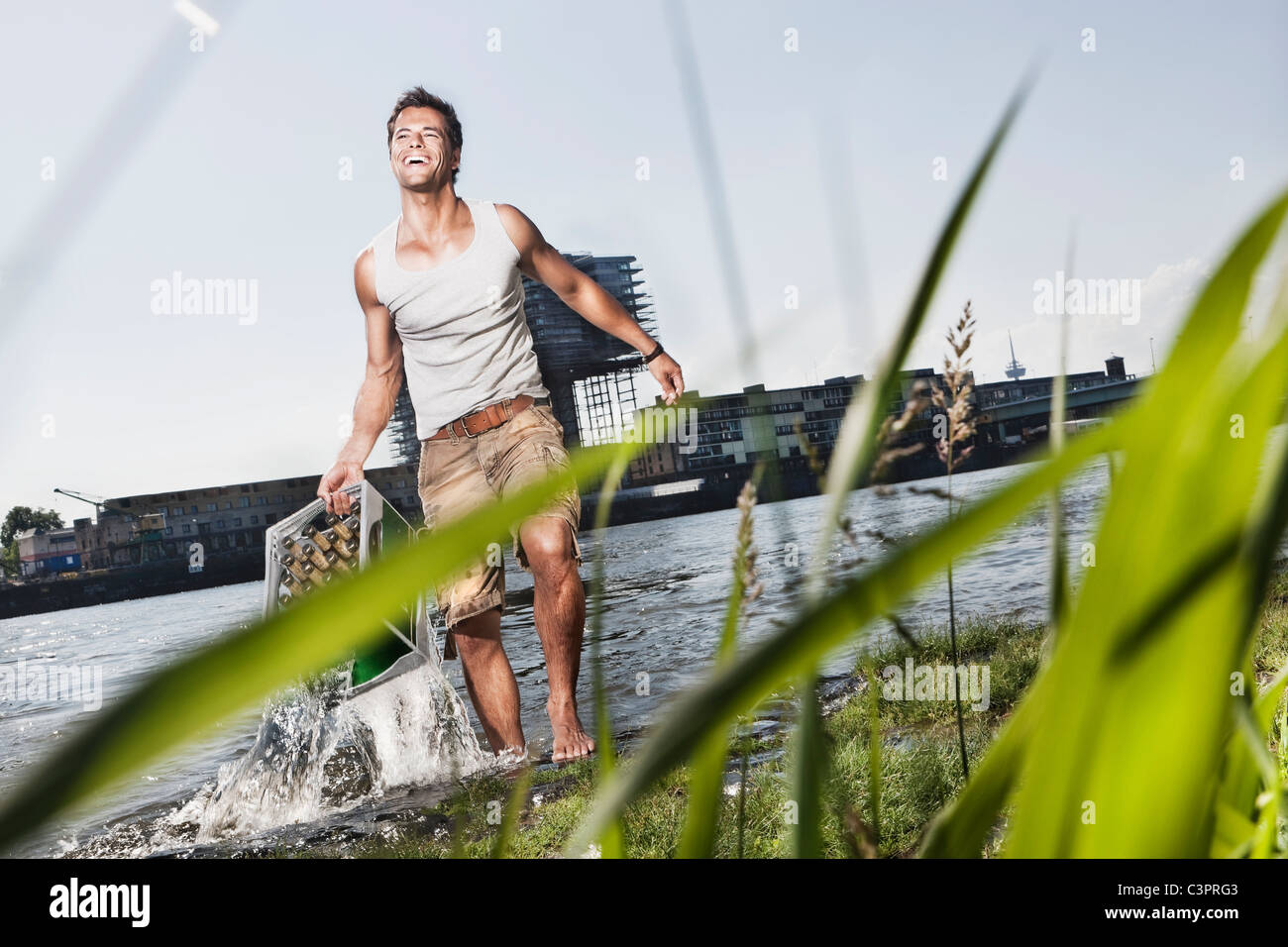 Man carrying crate beer on hi-res stock photography and images - Alamy