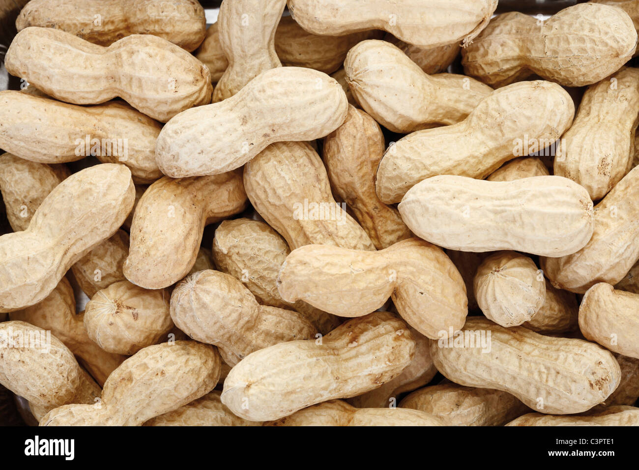 Peanuts, full frame, close up Stock Photo - Alamy
