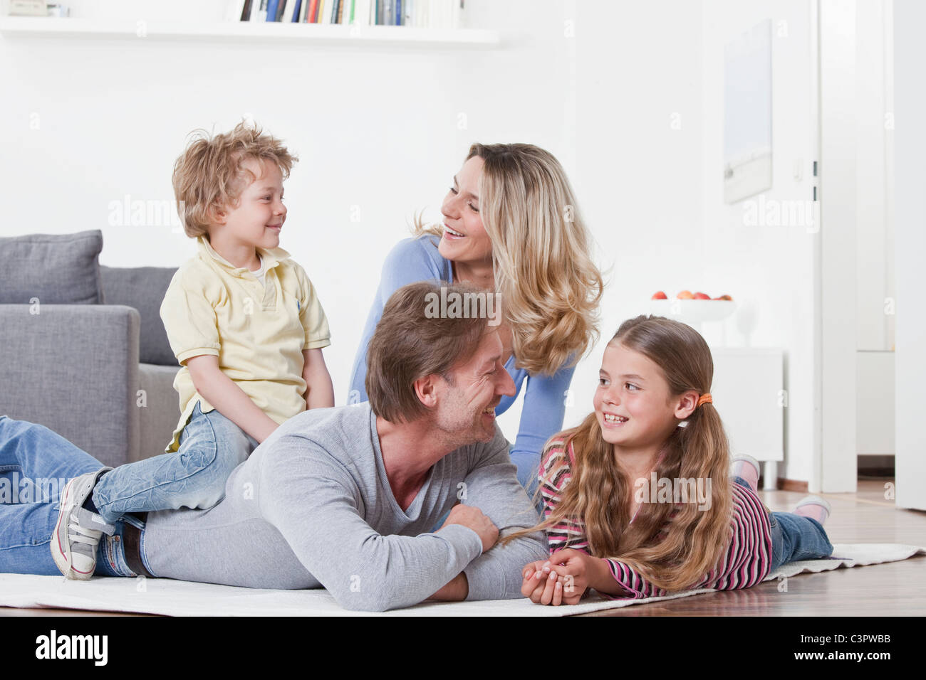 Smiling family having fun hi-res stock photography and images - Alamy