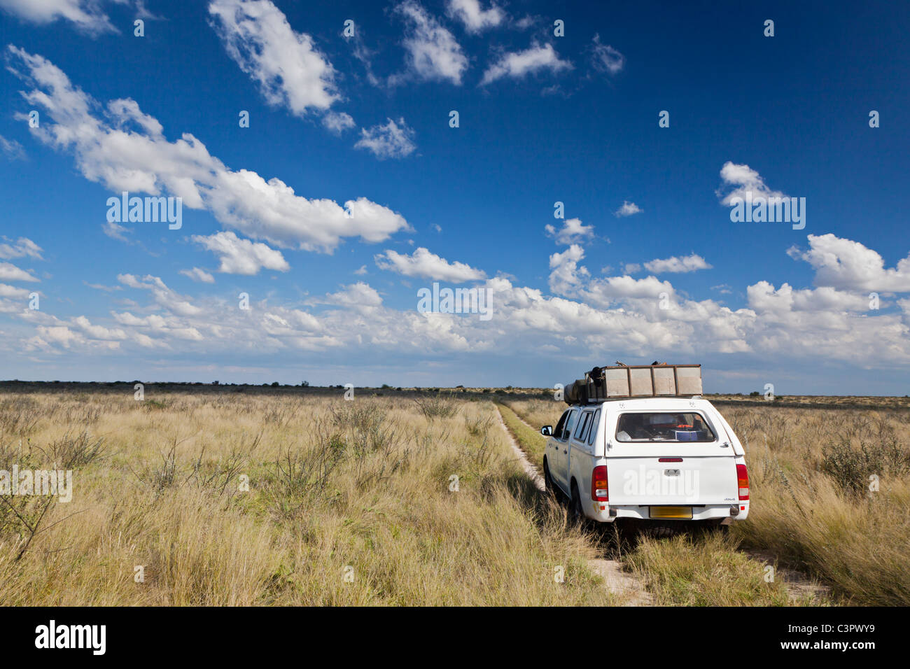 Africa, Botswana, Central Kalahari Game Reserve, View of 4x4 vehicle on ...