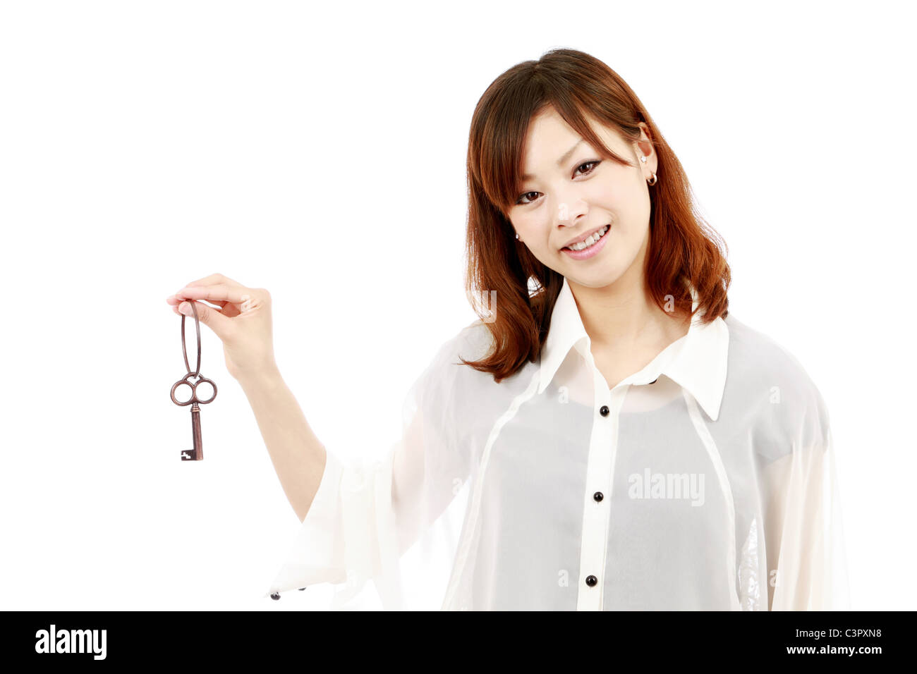 Beautiful Japanese woman holding a old key in her hand Stock Photo - Alamy