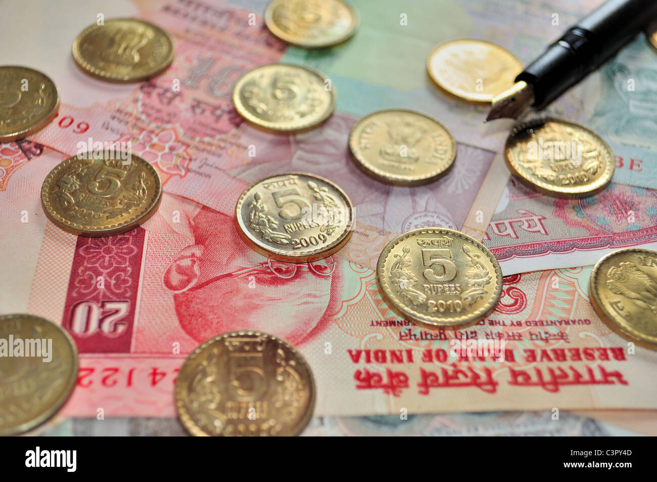 Indian Currency notes of denomination Rs.10 and Rs.5 and coins of ...