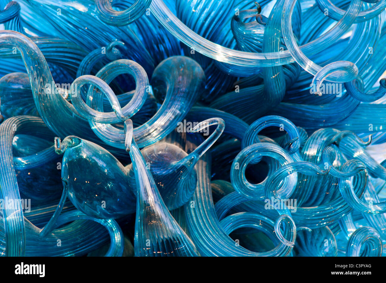 Colorful blue glass sculpture close up Stock Photo - Alamy