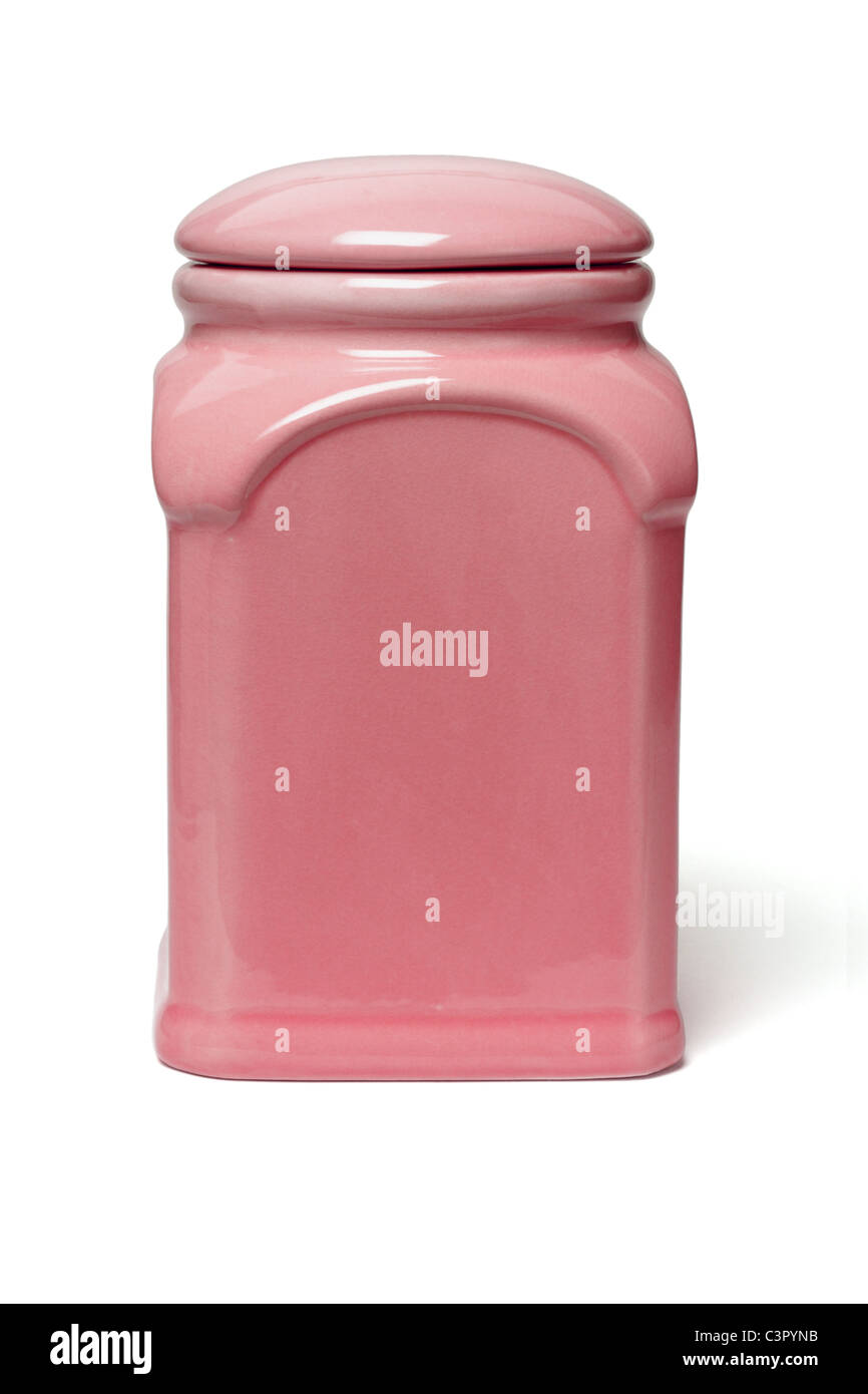 Red ceramic container with lid on white background Stock Photo - Alamy
